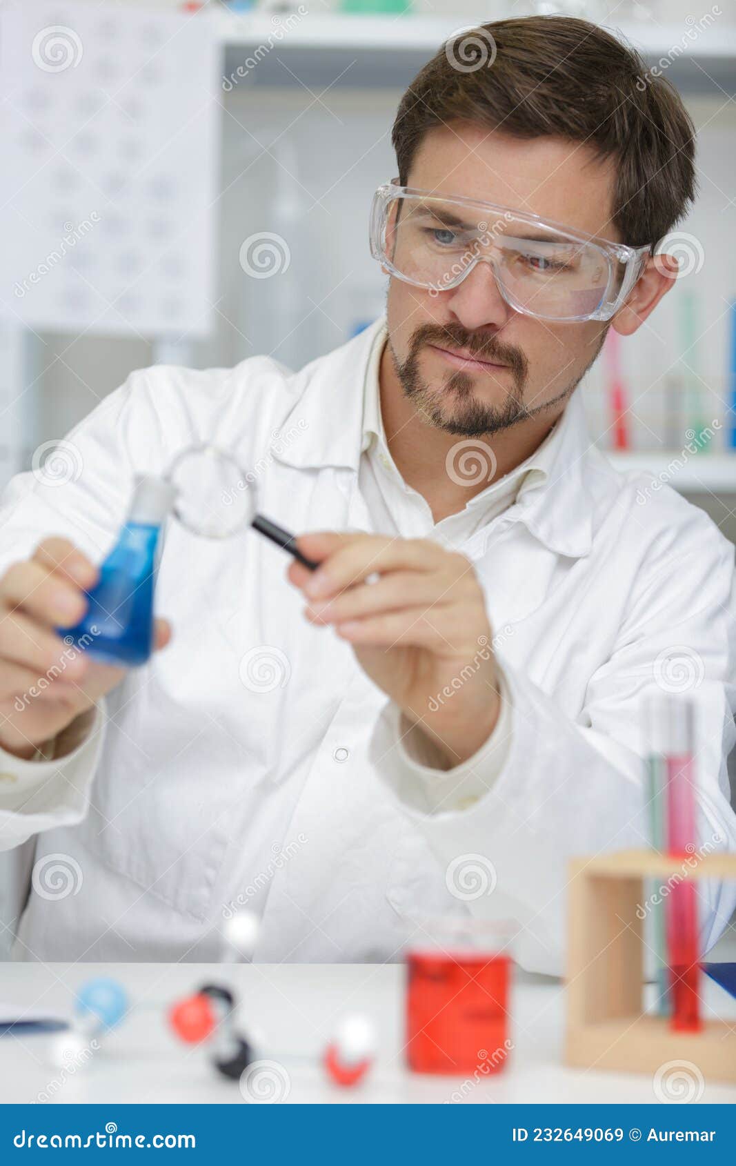 Man Analysing and Evaluating Molecules in Chemistry Lab Stock Image ...