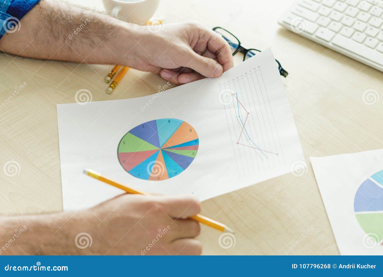 Man Analyzes the Data and Graphs. Business Analysis, Strategy Co Stock ...