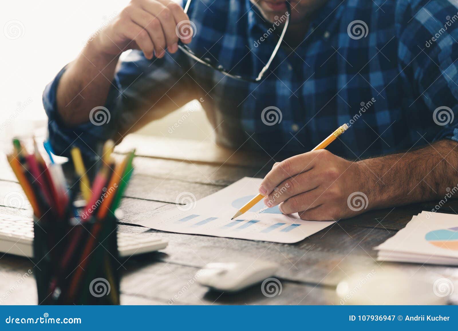 Man Analyzes the Data and Graphs in the Office Stock Image - Image of ...