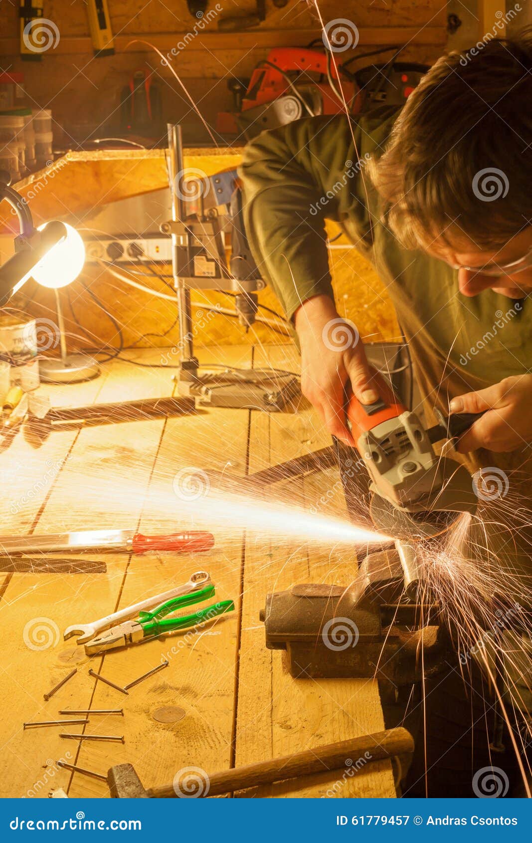 Man with angle grinder stock image. Image of fire, person - 61779457