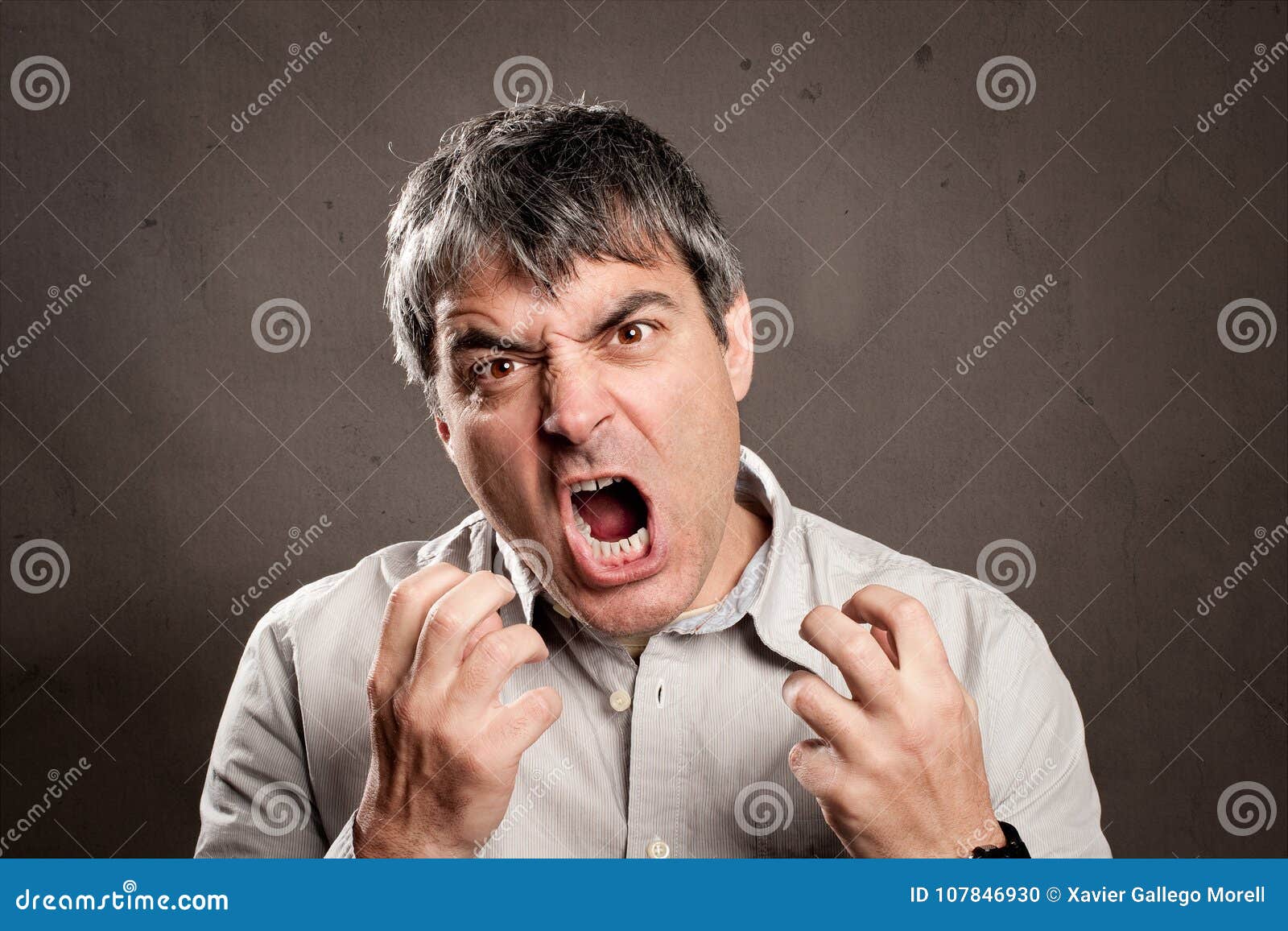 Man with angry expression stock photo. Image of gray - 107846930