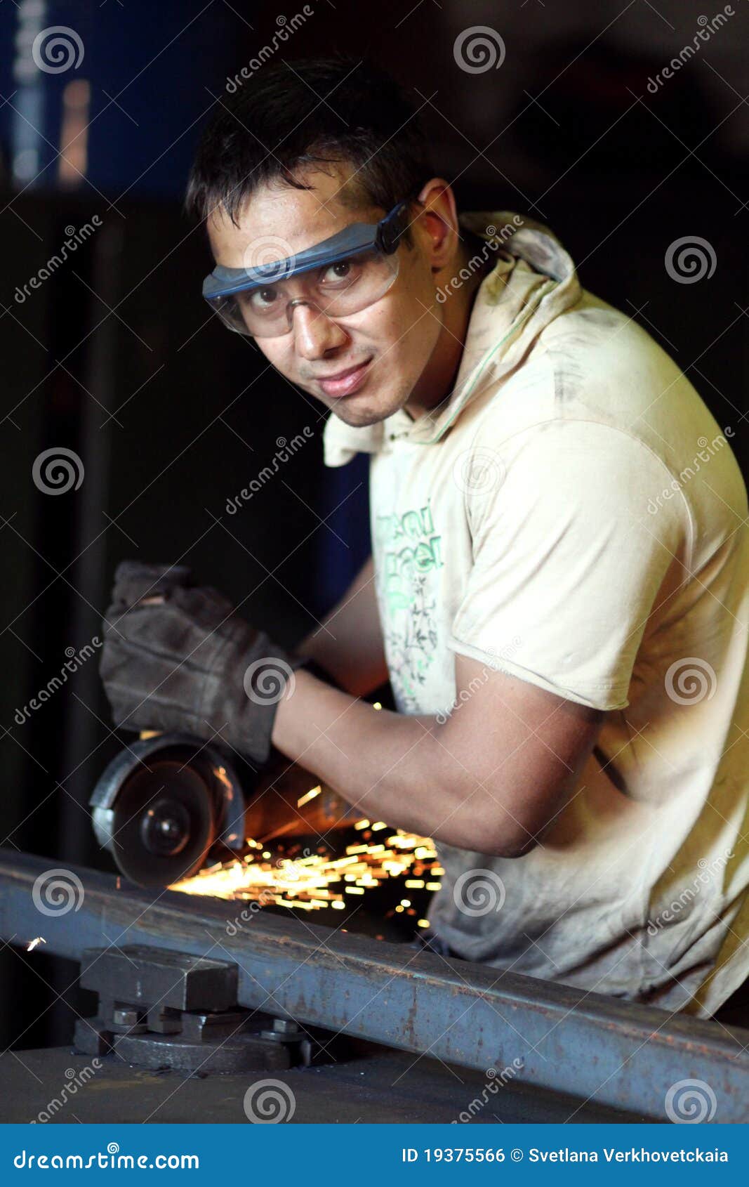 Man and angular grinder. stock photo. Image of human - 19375566