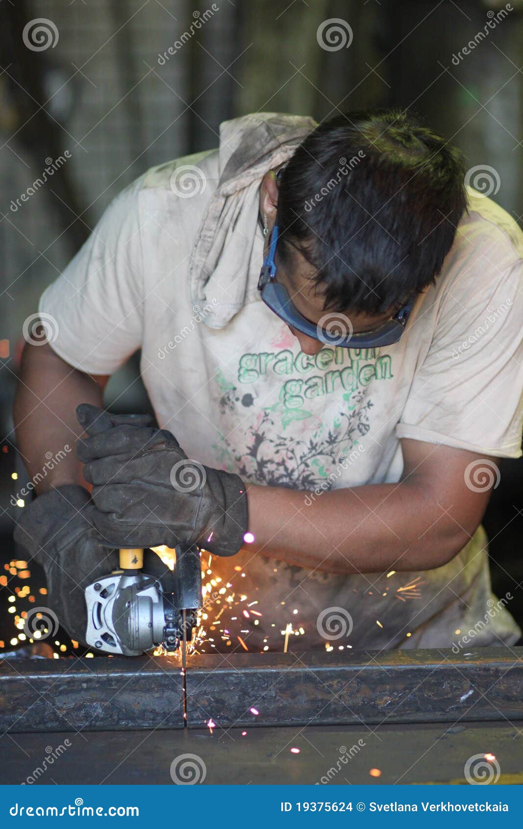 Man and angular grinder. stock photo. Image of gloves - 19375624