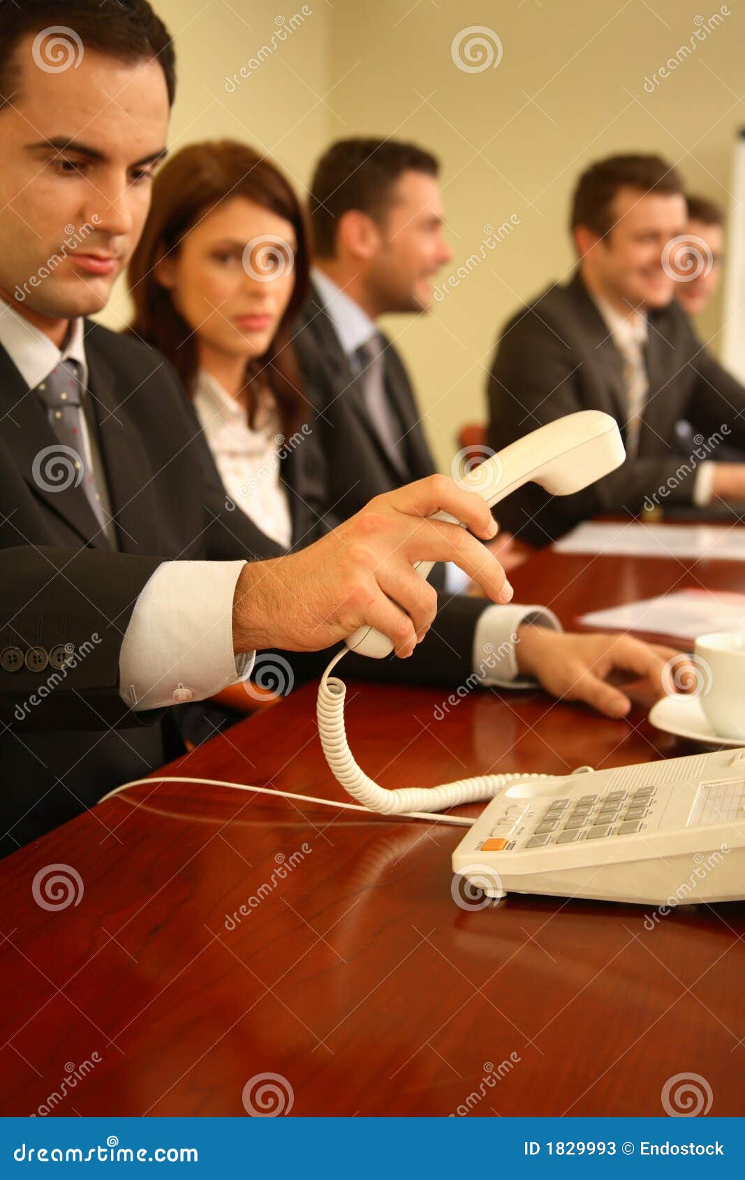 Man Answering Phone in Meeting Stock Image - Image of hand, female: 1829993
