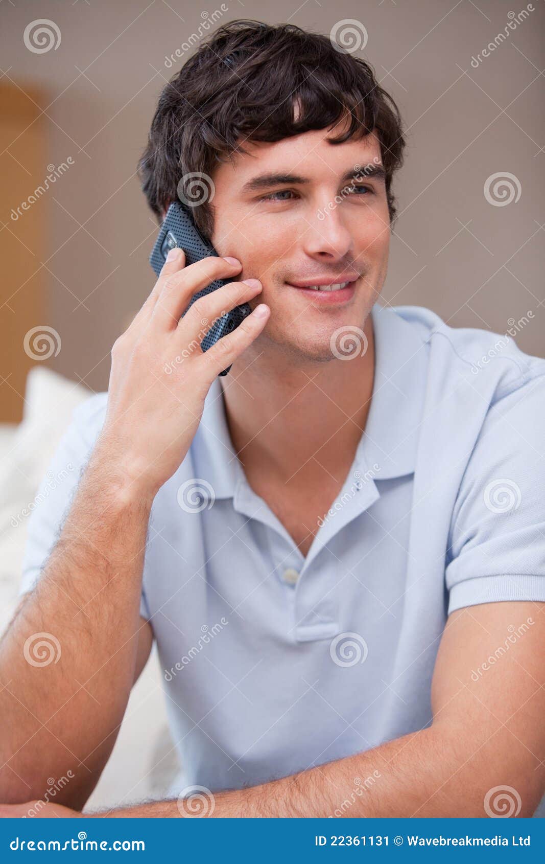 Man answering phonecall stock image. Image of joyful - 22361131
