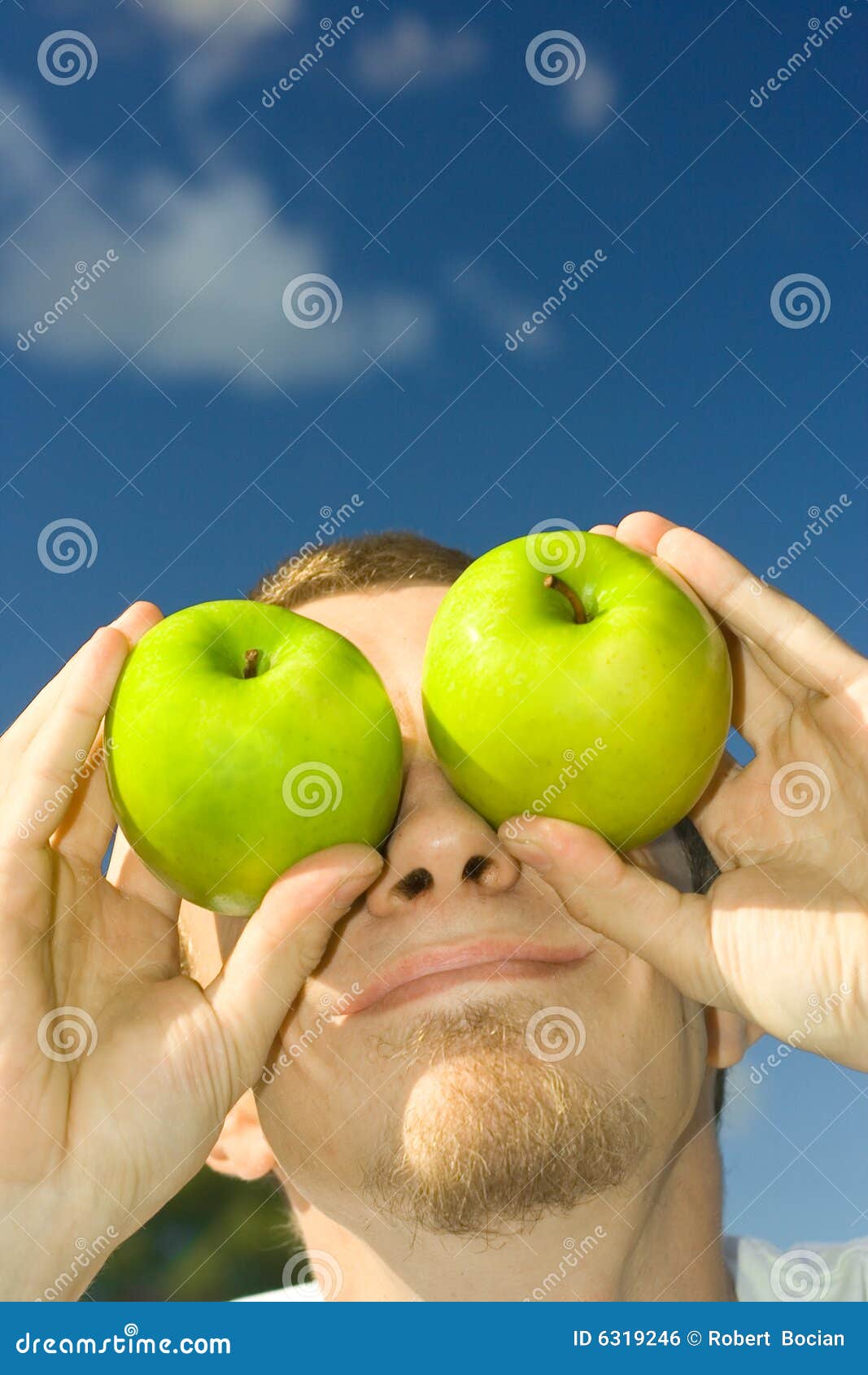 Man with apple stock photo. Image of attractive, head - 6319246