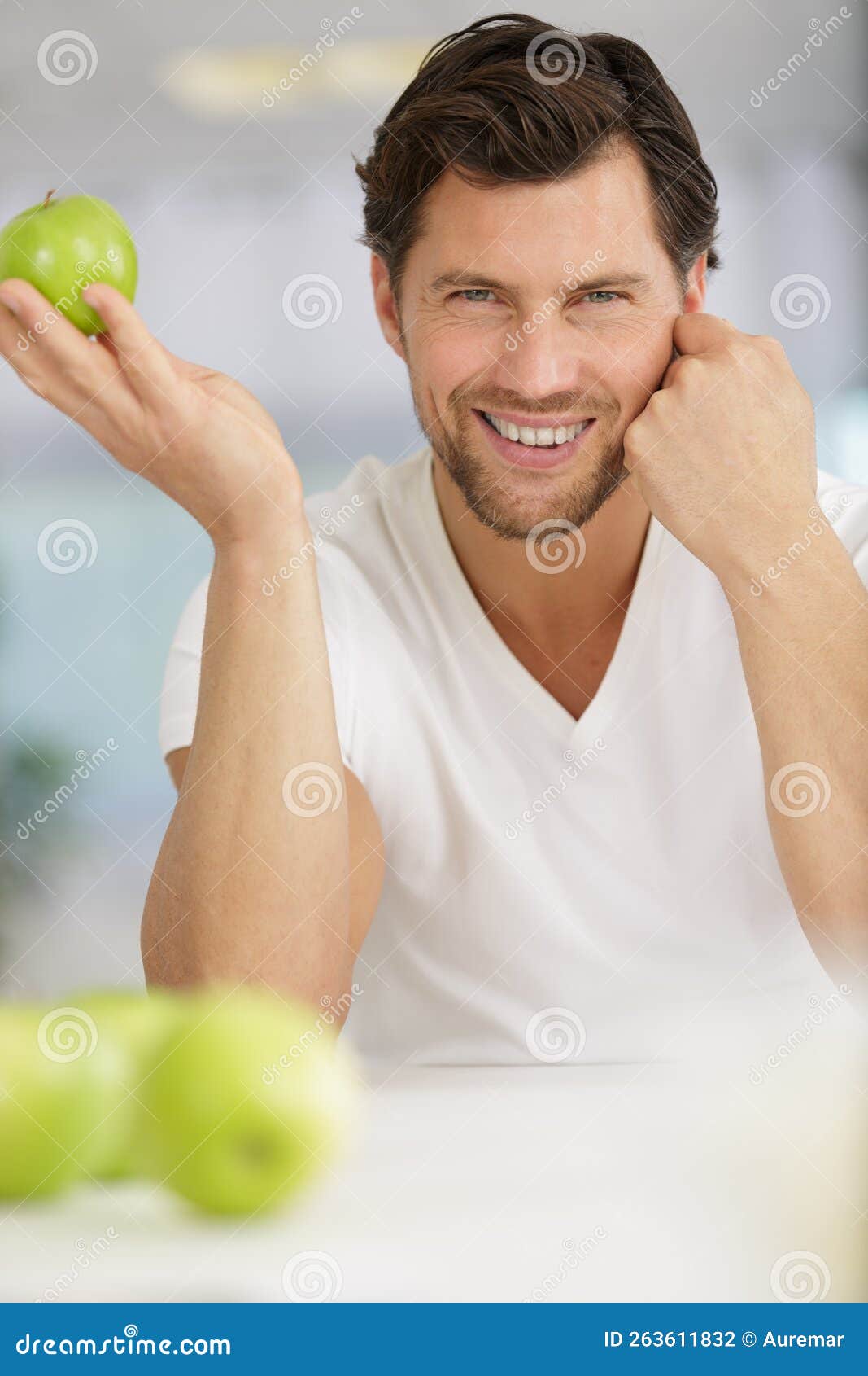 Man with apple logo fruit stock photo. Image of looking - 263611832