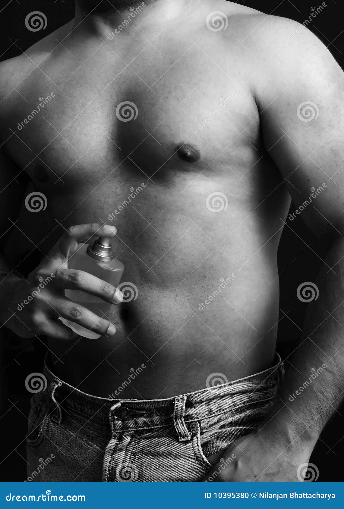 Man applying cologne stock photo. Image of perfume, monochrome - 10395380