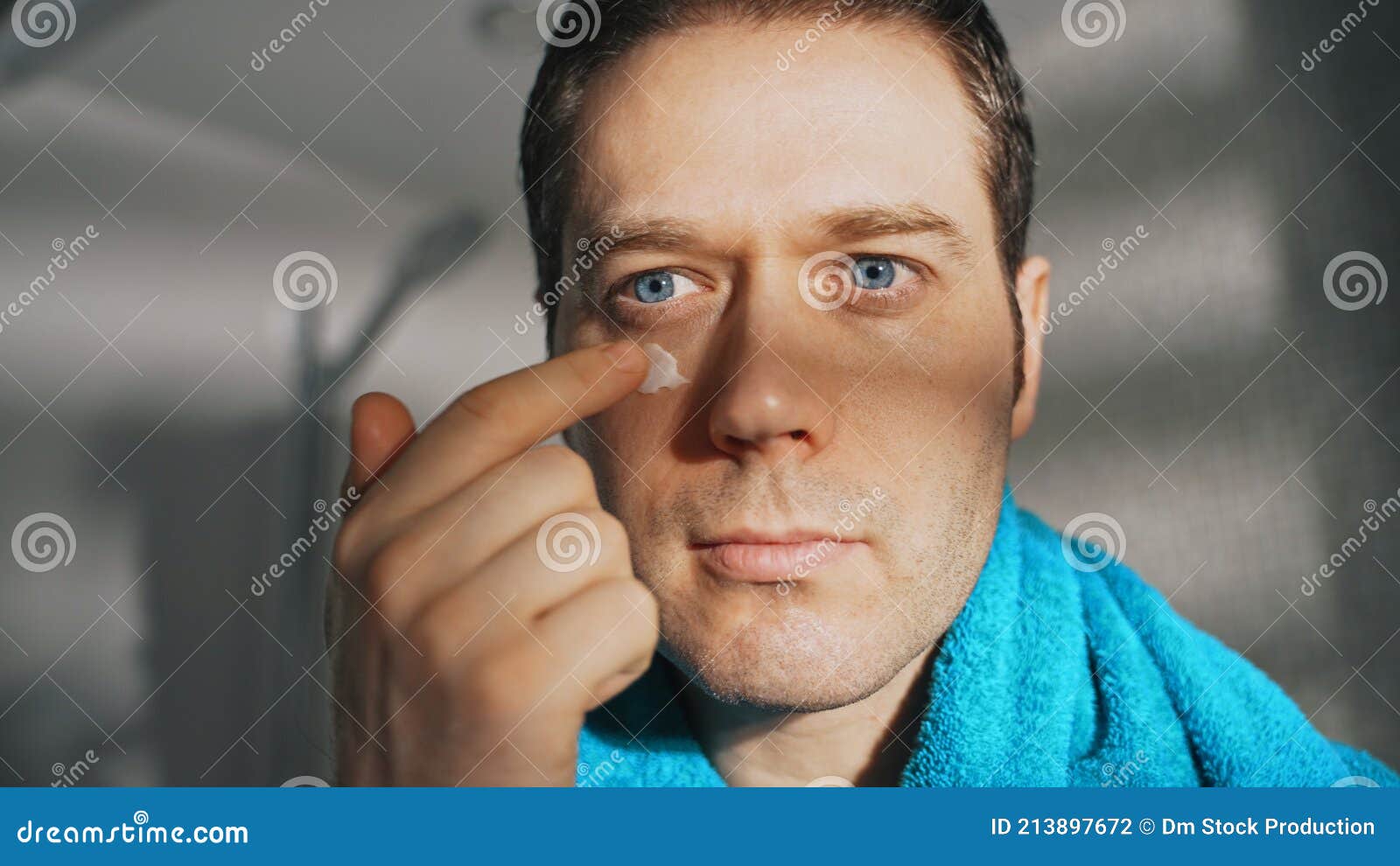 Man applying cream stock photo. Image of morning, nourishing - 213897672