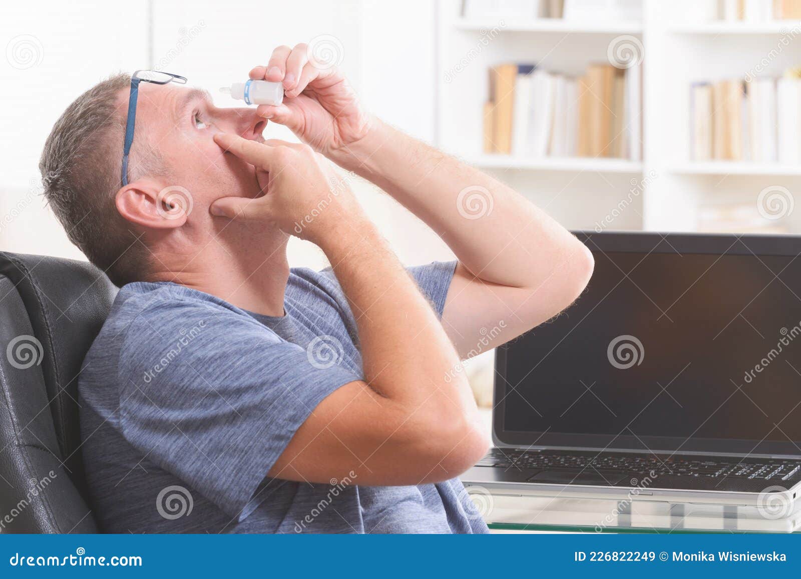 Man applying eye drops stock image. Image of adult, eyesight - 226822249