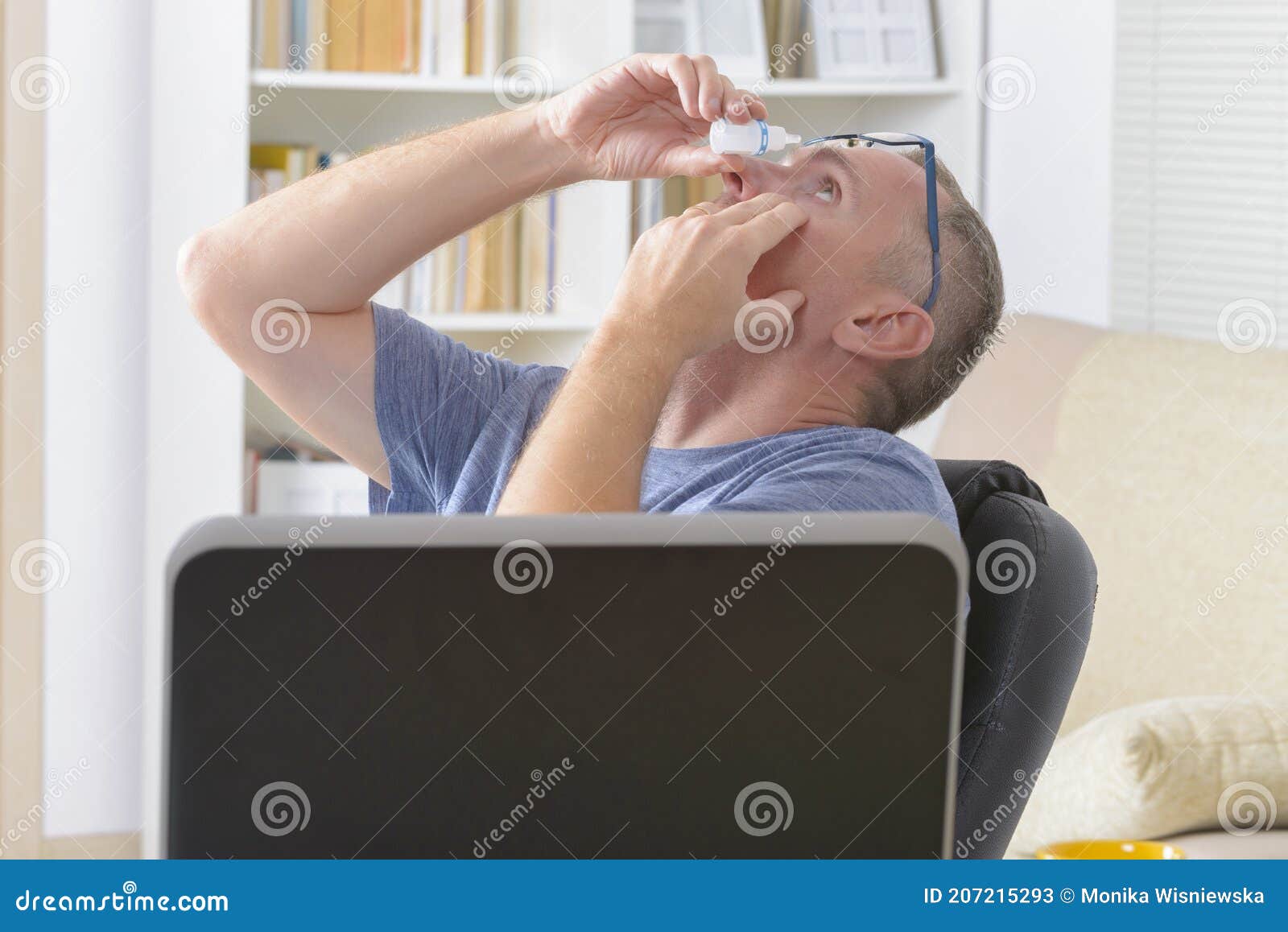 Man applying eye drops stock image. Image of eyesight - 207215293