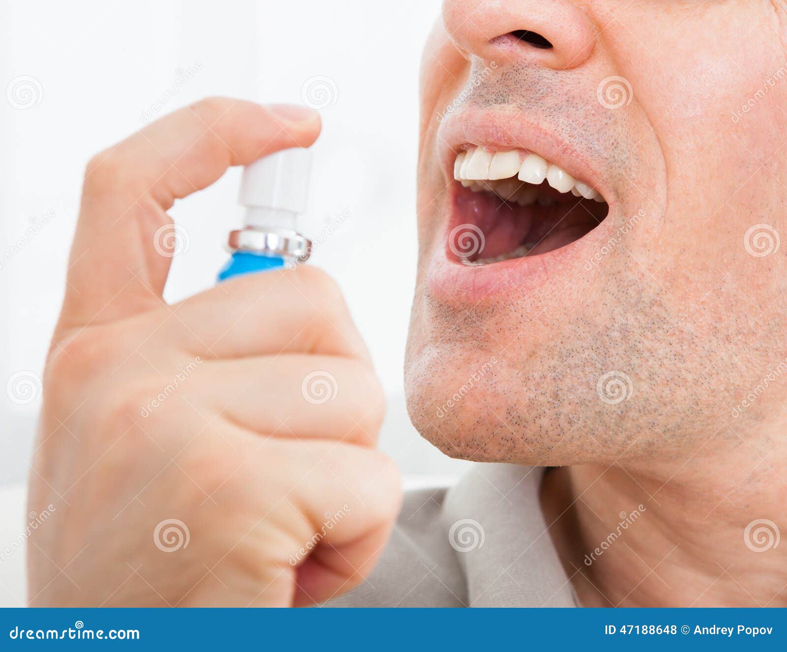 Man Applying Fresh Breath Spray Stock Photo - Image of hair, object ...