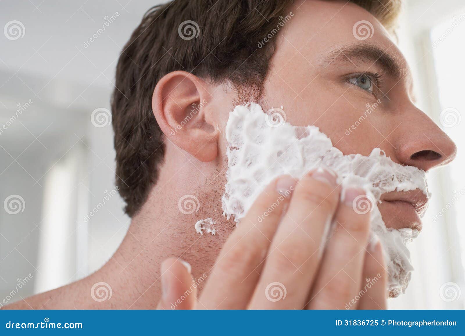 Man Applying Shaving Cream stock image. Image of scenes - 31836725
