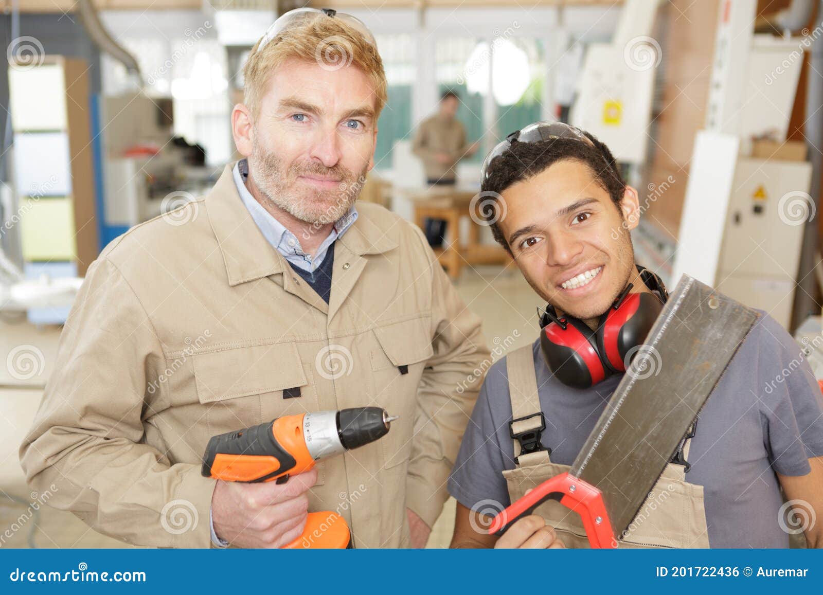Man and Apprentice Looking at Camera Stock Photo - Image of learning ...