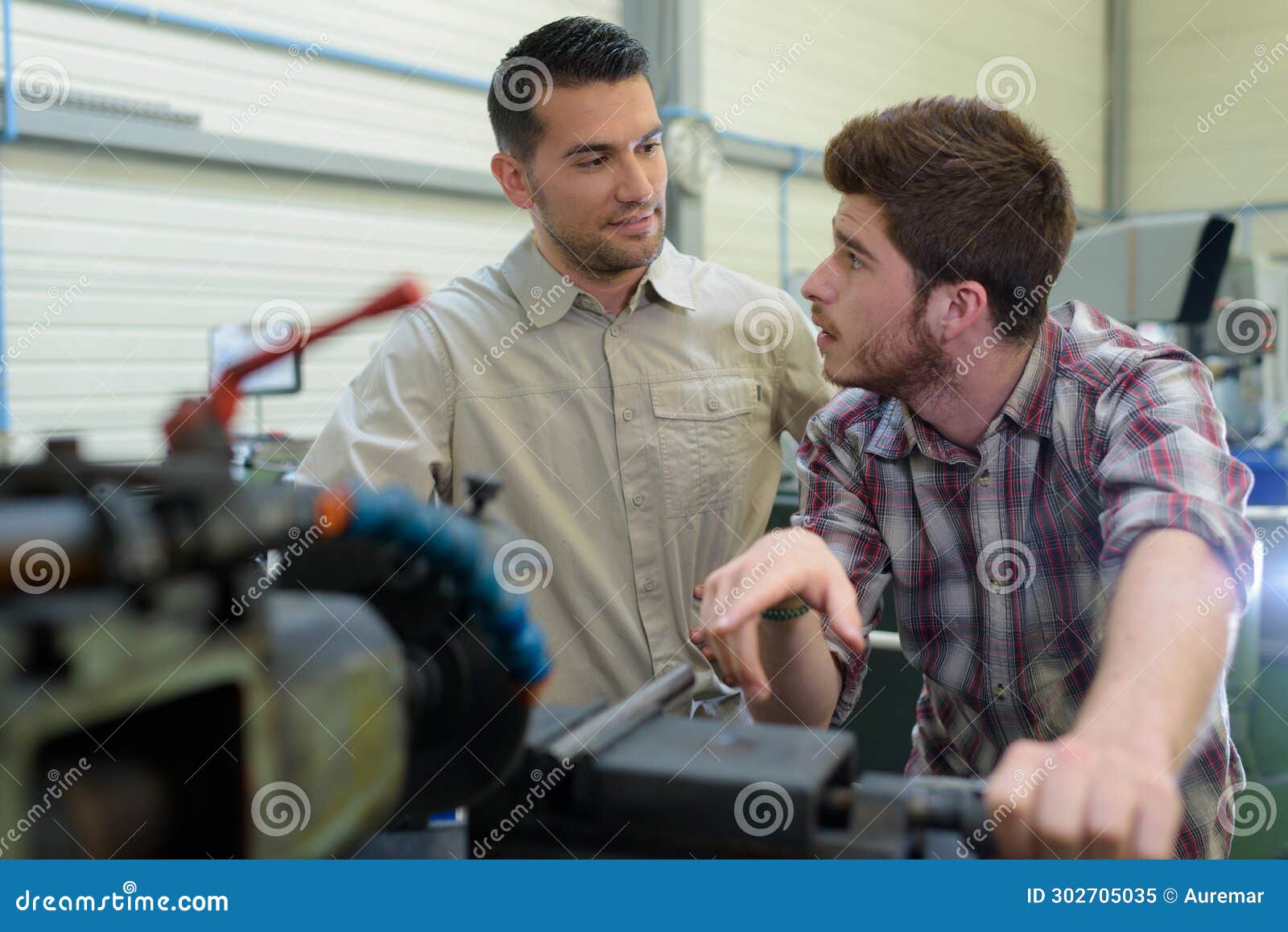 Man with Apprentice Lubricating Bearing Stock Image - Image of printing ...