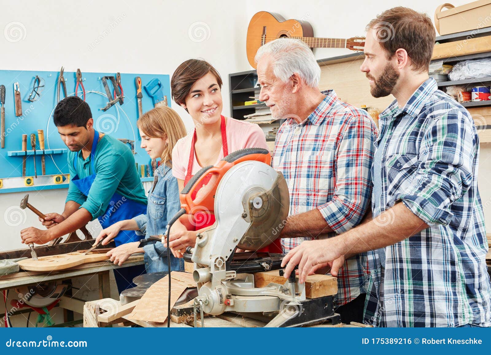Man with Apprentice and Trainee in Workshop Stock Photo - Image of ...