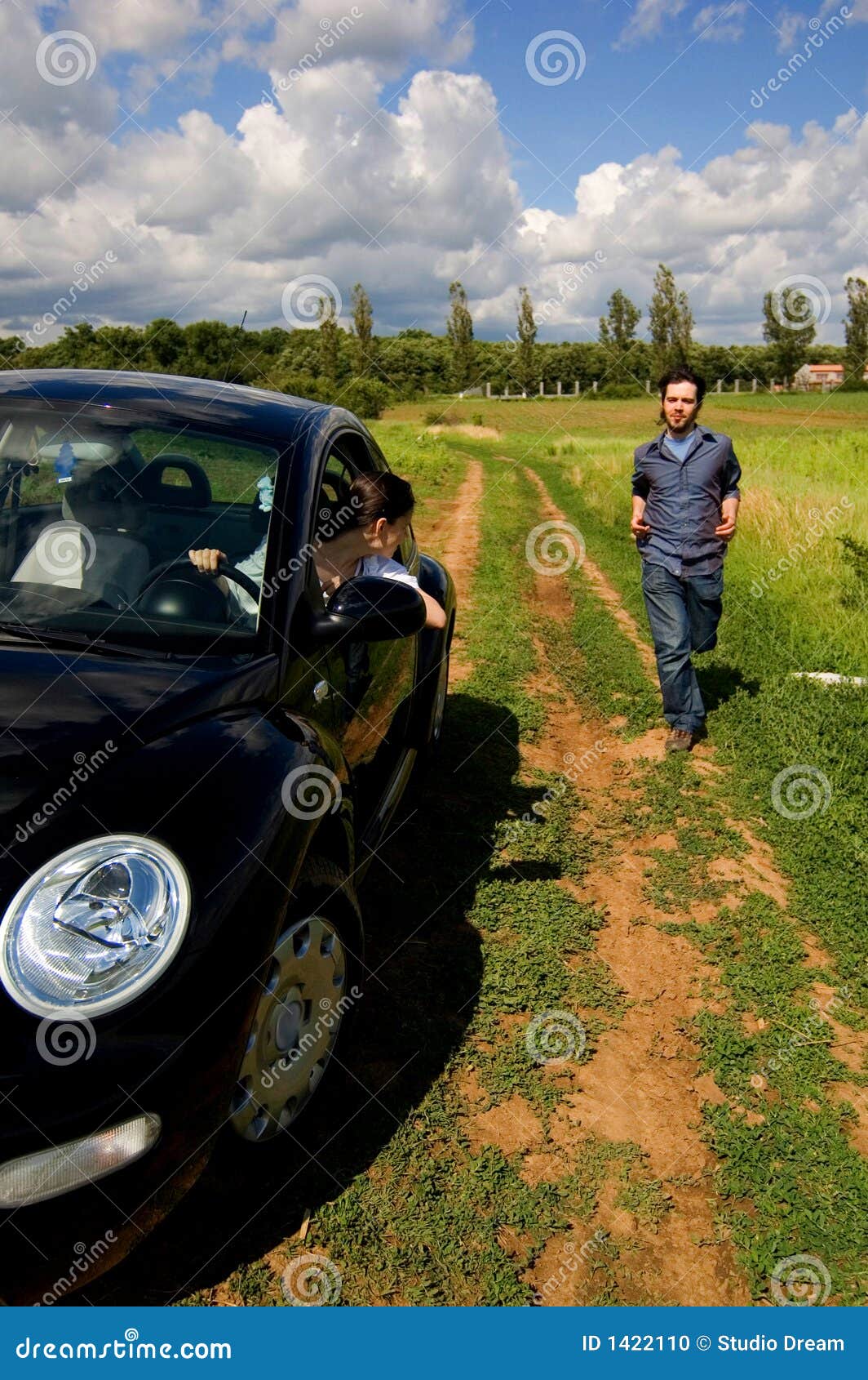 Man Approaching Woman S Car Stock Photo - Image of clouds, field: 1422110