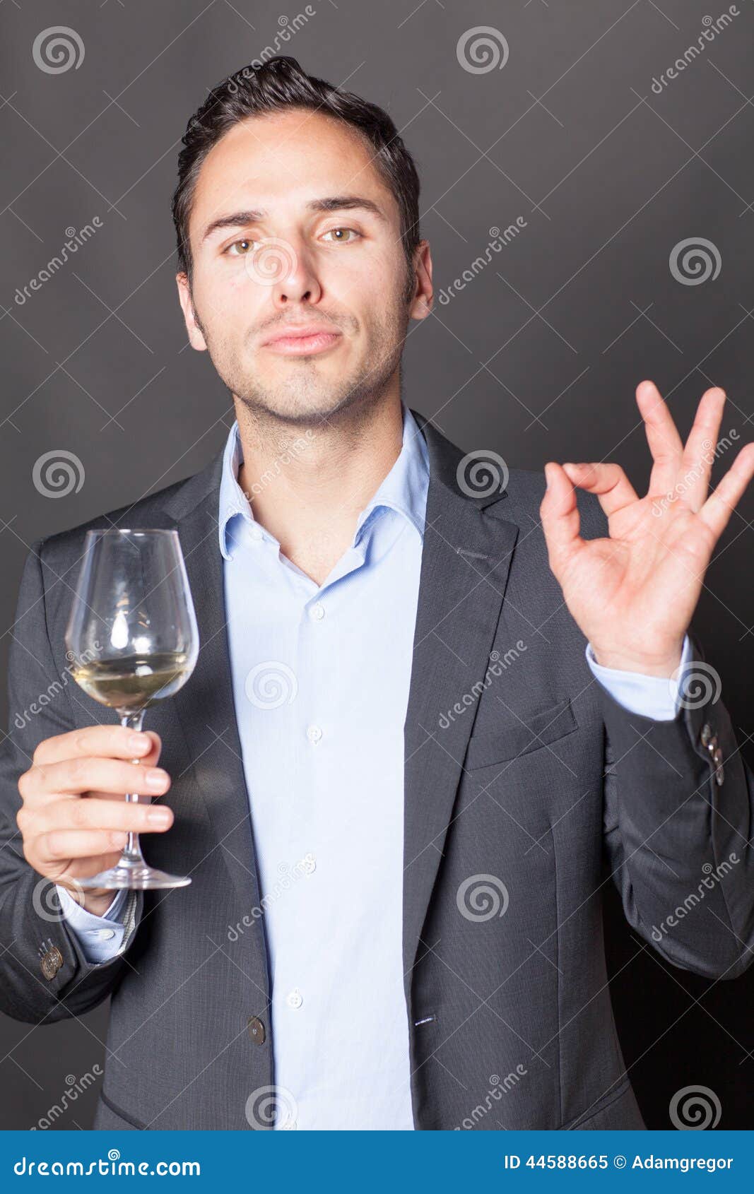 Man Approving a Glass of White Wine Stock Image - Image of consumers ...
