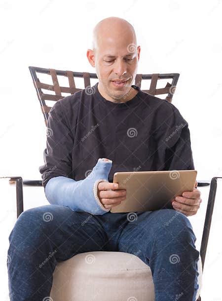 Man with Arm Cast Using an Accessible Tablet Stock Image - Image of ...