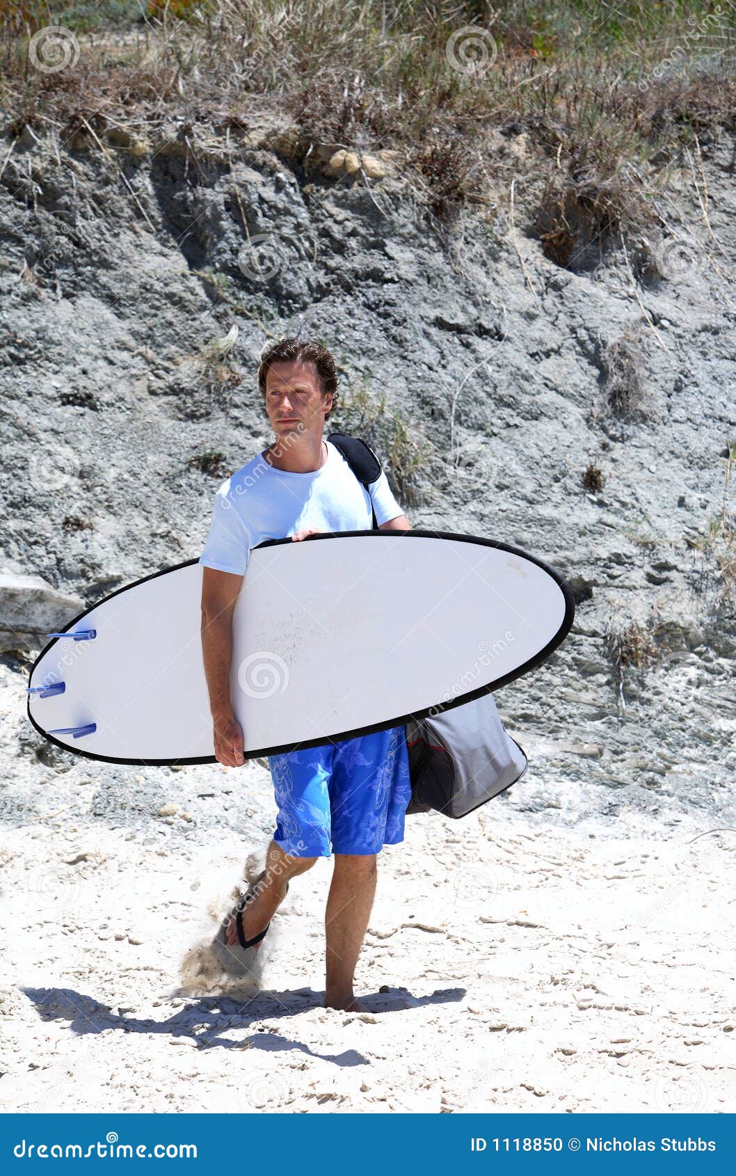 Man Arriving at the Beach To Surf Stock Photo - Image of surfboard ...