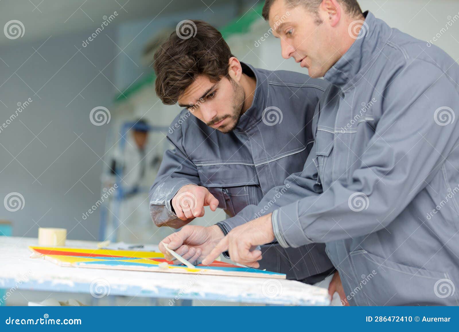 Man As Apprentice Works in Teamwork Together Stock Photo - Image of ...