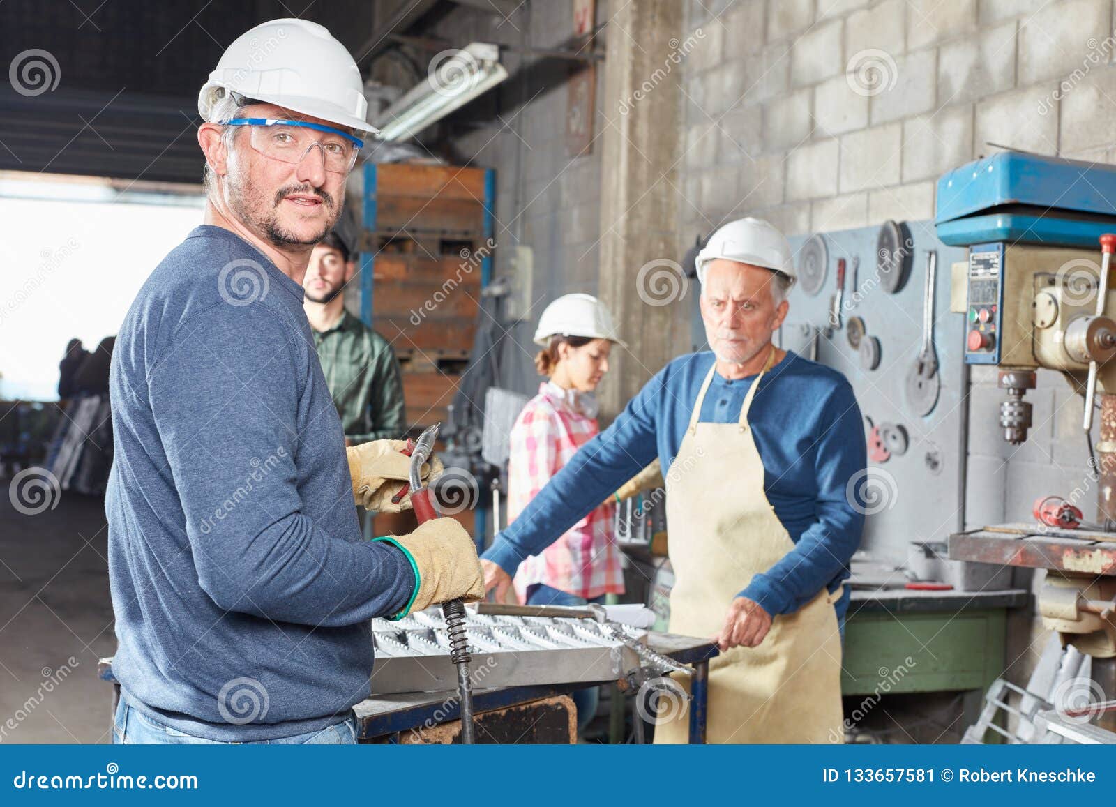 Man As Blue Collar Worker with Welding Machine Stock Image - Image of ...