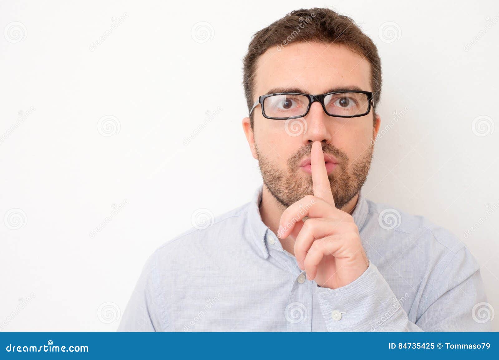 Man Asking for Silence Using Finger Gesture Stock Image - Image of ...