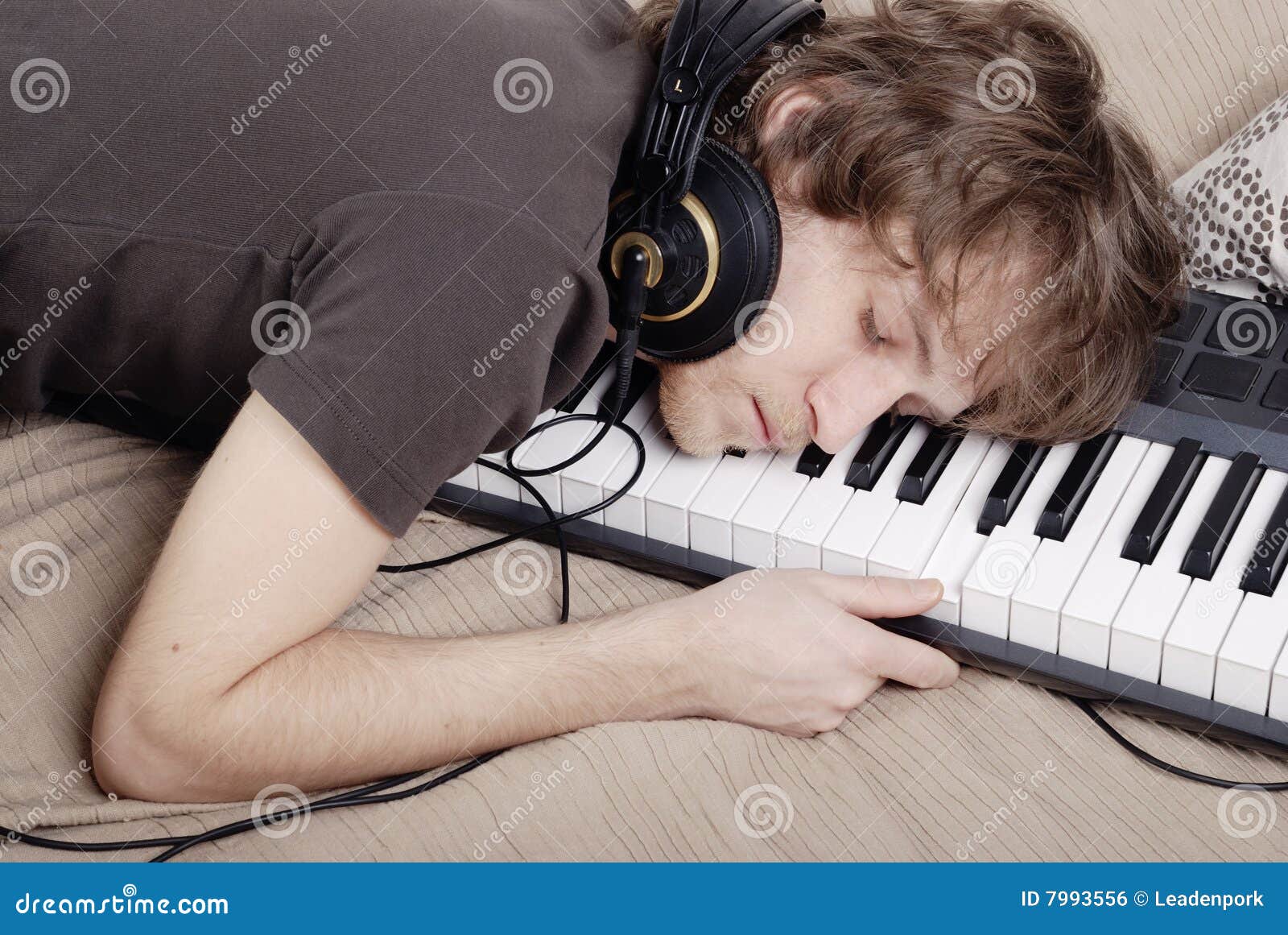 Man Asleep on the MIDI-keyboard Stock Photo - Image of body, shirt: 7993556
