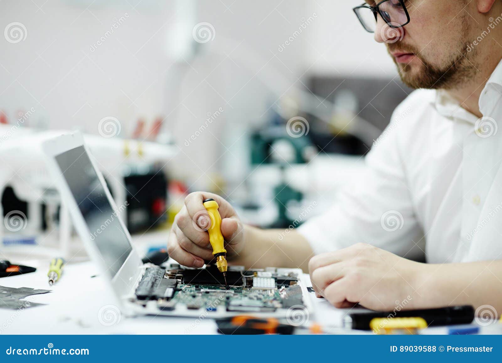 Man Assembling Circuit Board in Laptop Stock Photo - Image of circuit ...