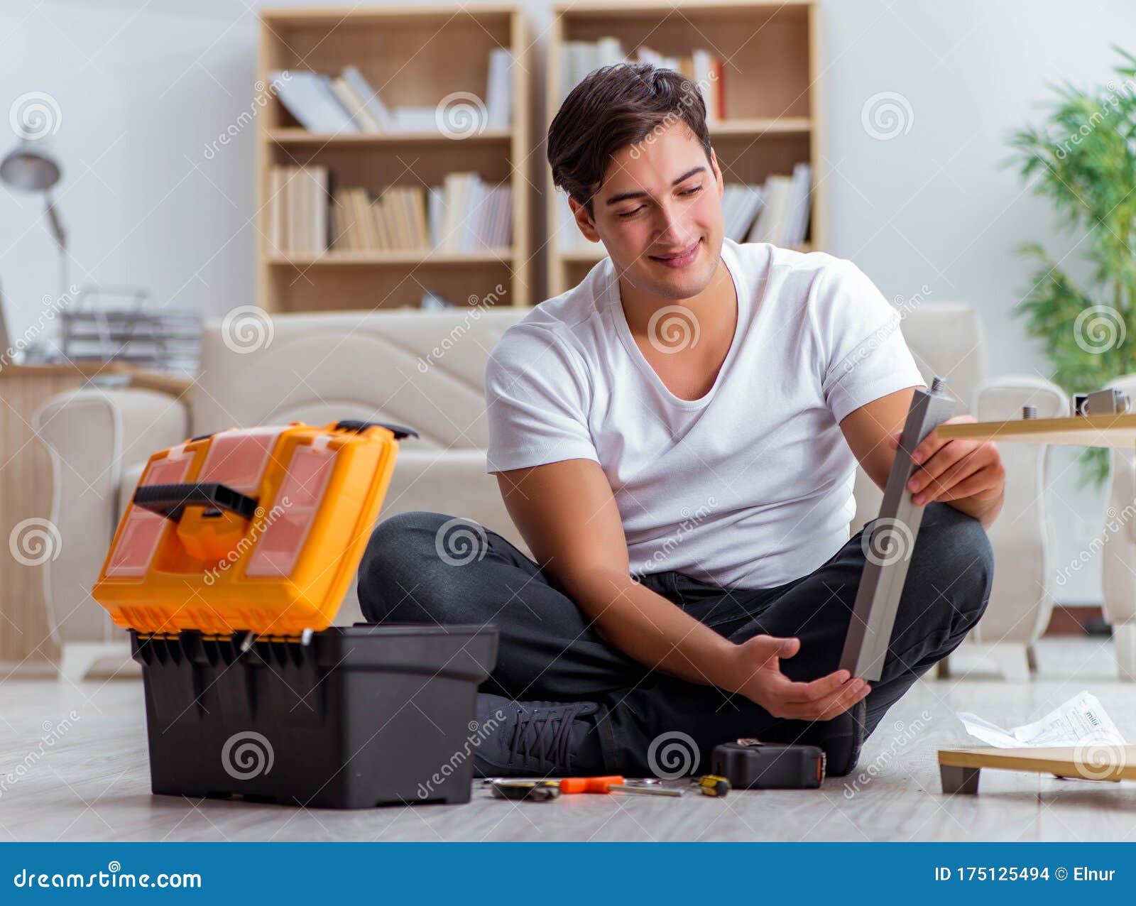 Man Assembling Furniture at Home Stock Photo - Image of installing ...