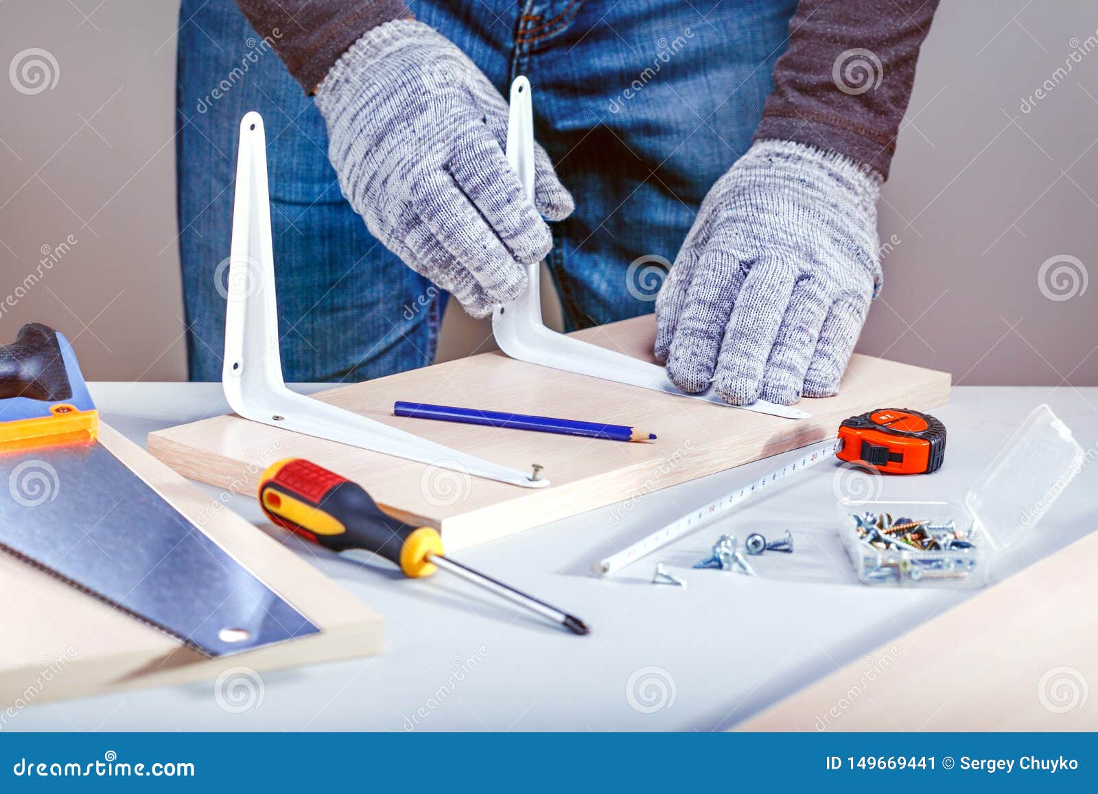 Man Assembling Furniture Using Manual Tools Stock Image Image Of