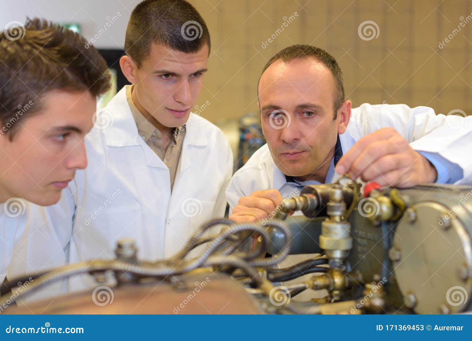 Man assembling machine stock image. Image of demonstration - 171369453