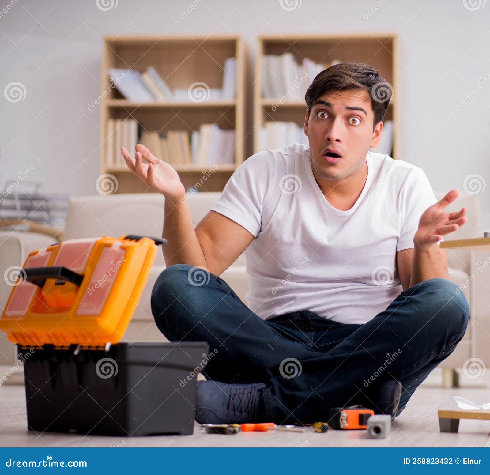 Man Assembling Shelf at Home Stock Photo - Image of handyman, male ...