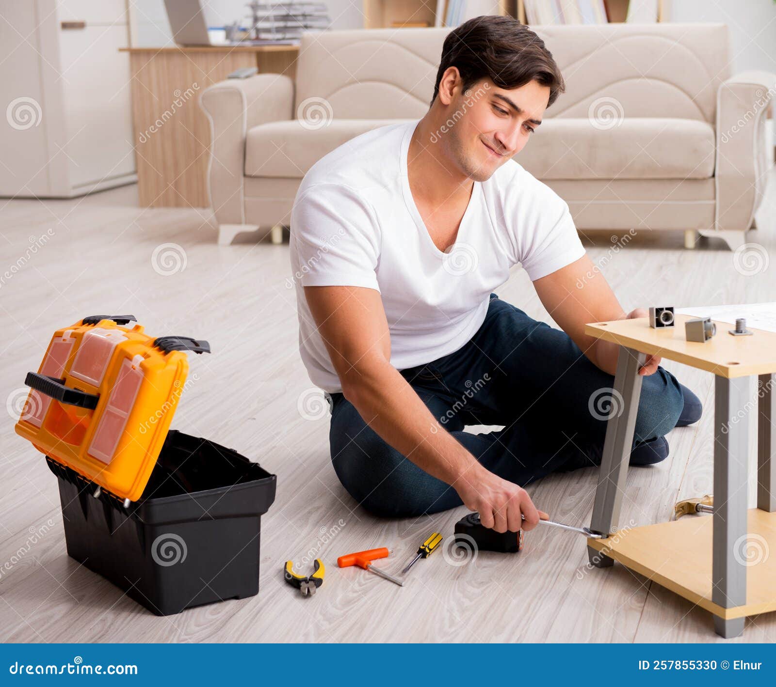 Man Assembling Shelf at Home Stock Photo - Image of furniture, fixing ...