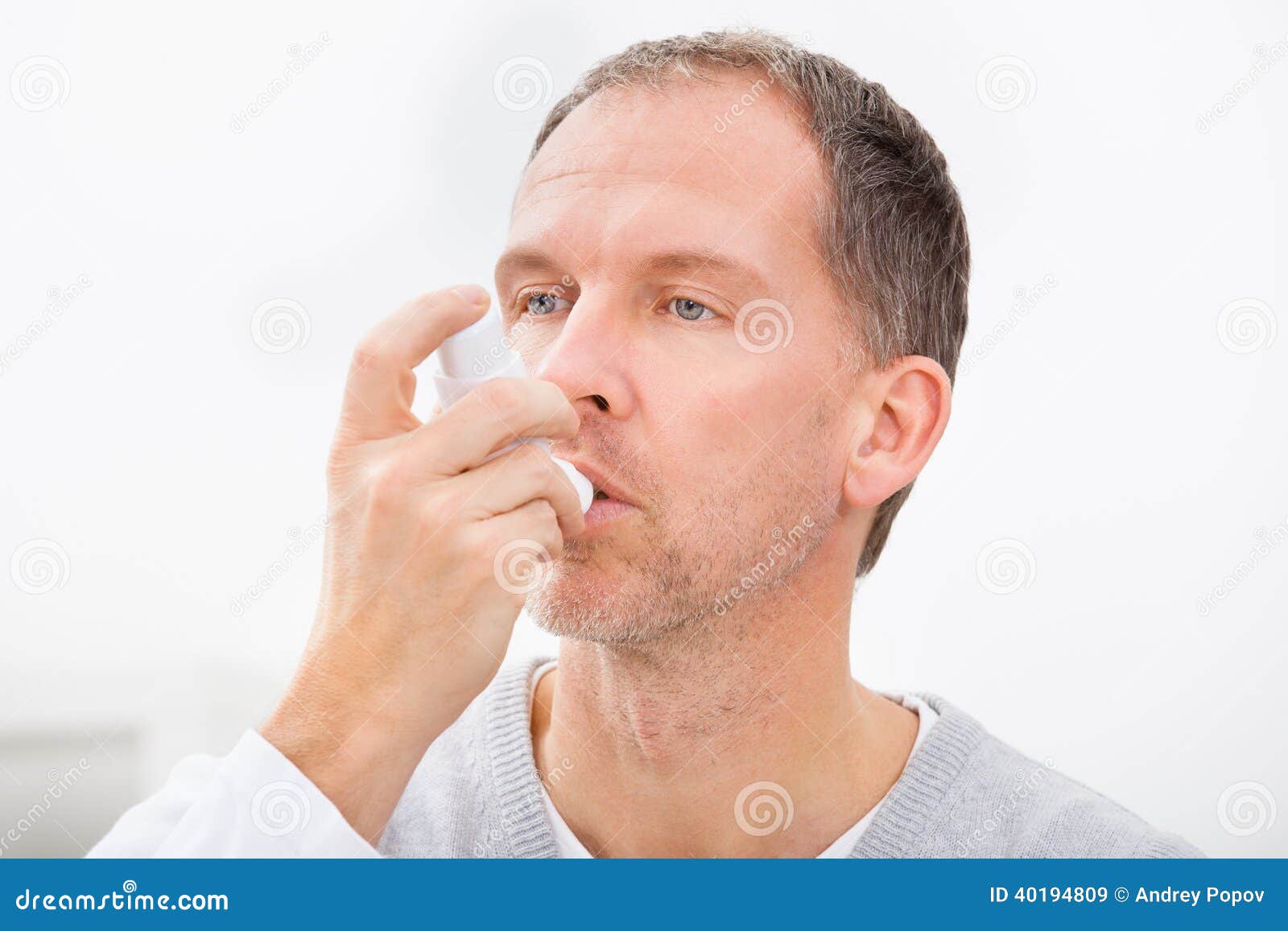 Man with asthma inhaler stock image. Image of hair, allergy - 40194809