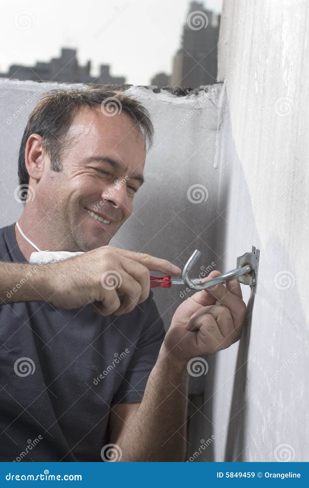 Man Attaching Hook - Vertical Stock Image - Image of latin, equipment ...
