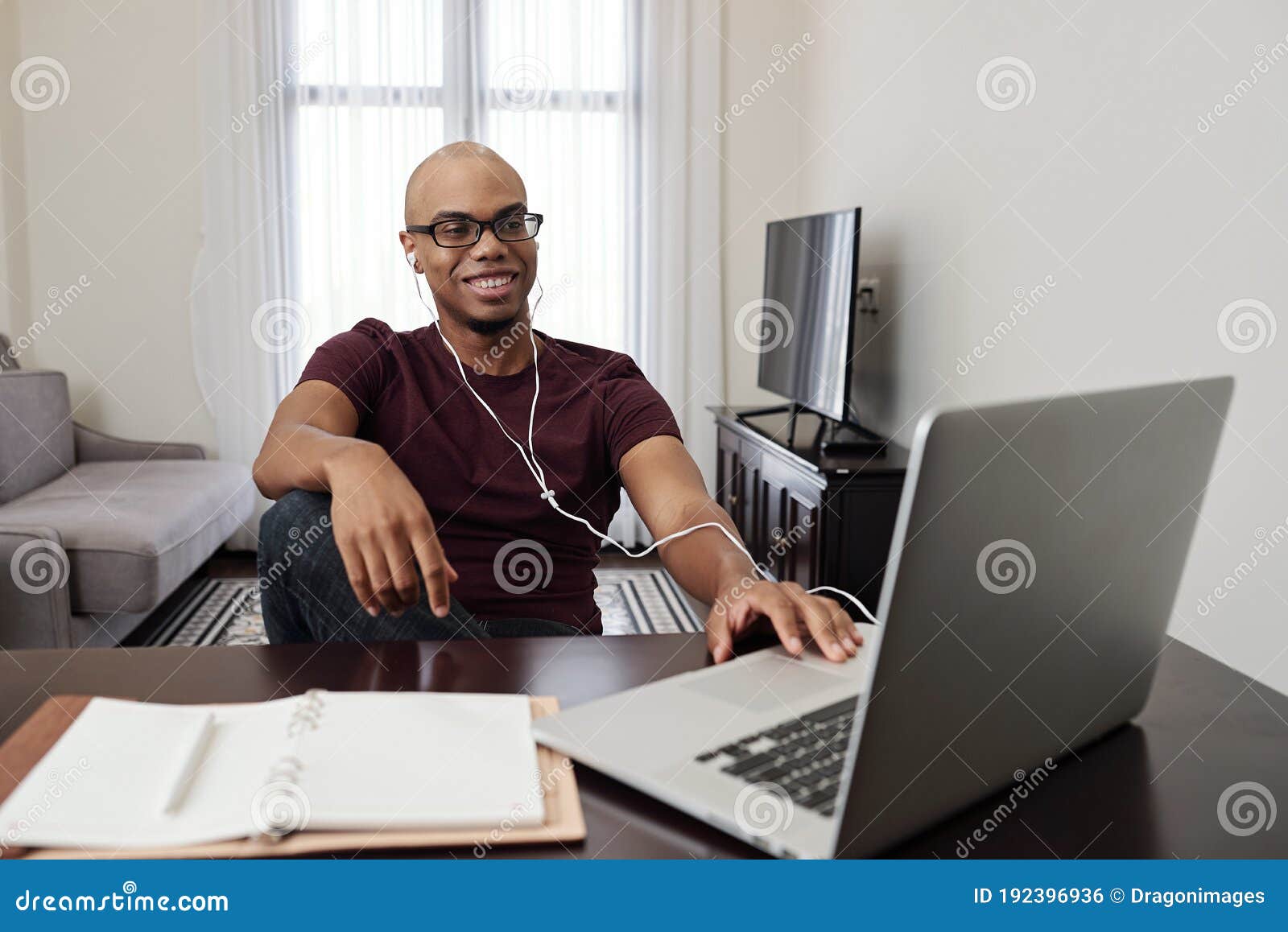 Man attending online class stock photo. Image of communication - 192396936