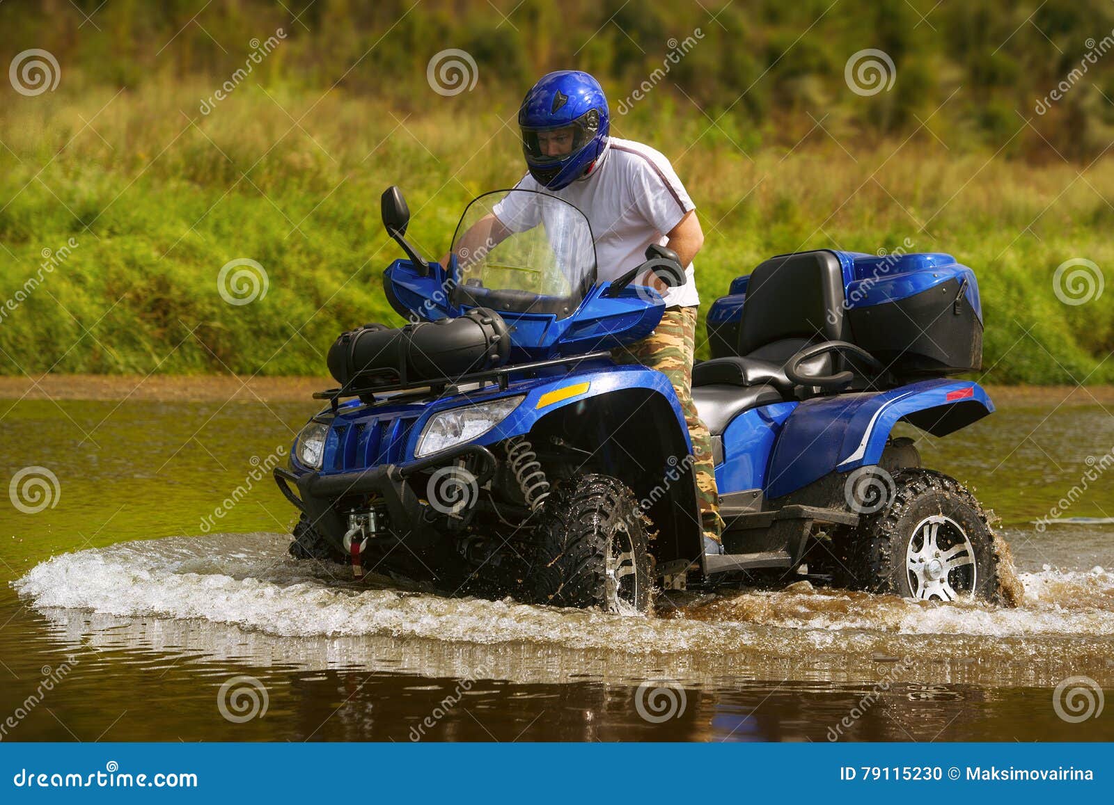 Man on ATV. stock photo. Image of dirt, heat, water, country - 79115230
