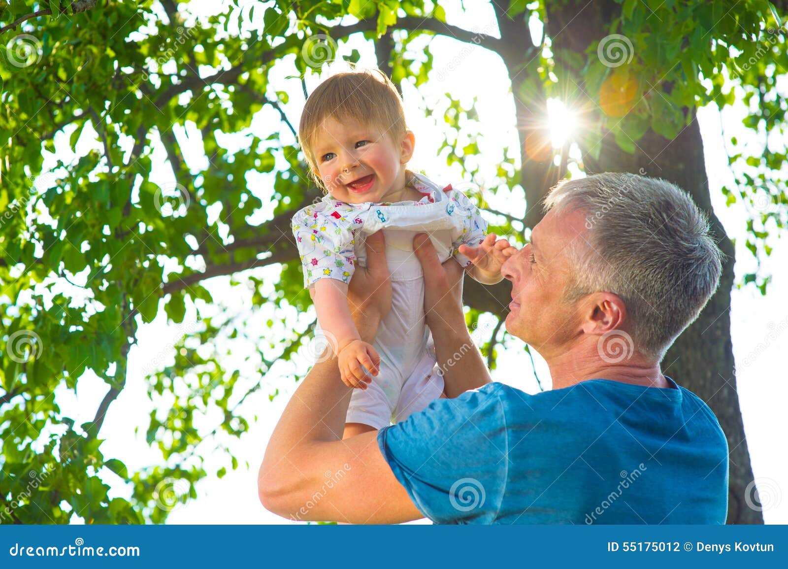 Man with baby. stock photo. Image of playing, father - 55175012