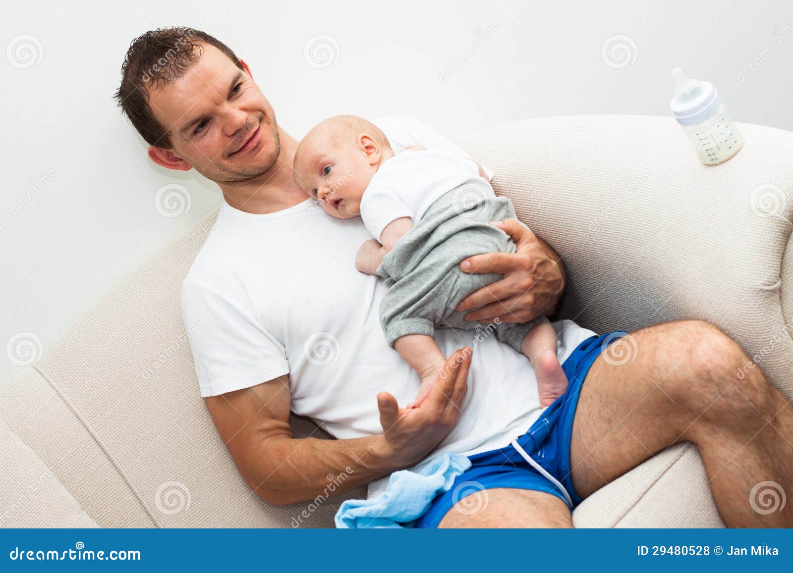 Man and baby at home stock photo. Image of childhood - 29480528