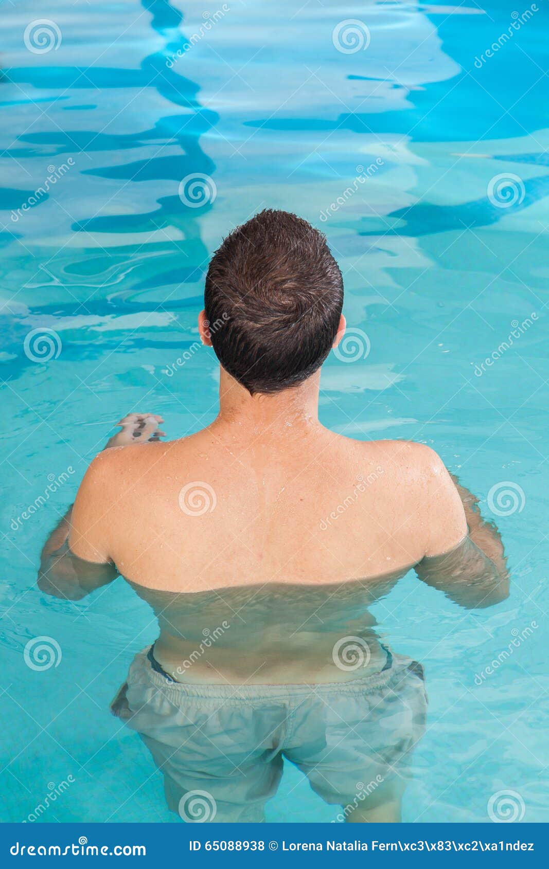 Man back inside the pool stock photo. Image of hotel - 65088938