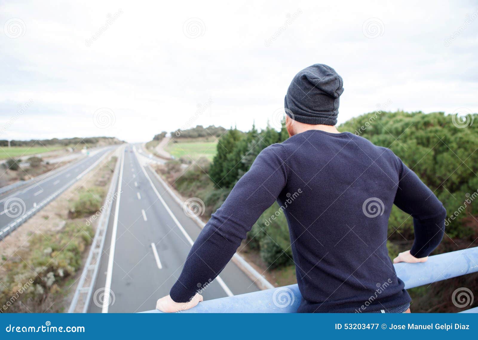 Man Back at the Top of a Bridge Over a Highway Stock Image - Image of ...