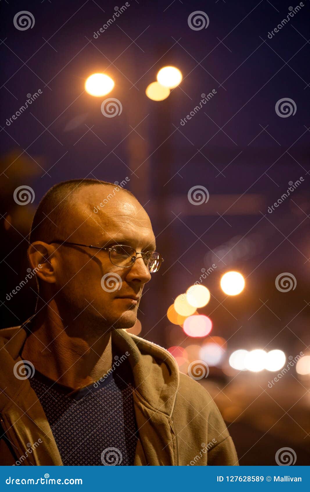 Man in the Background of Night Lights Stock Image - Image of blur ...