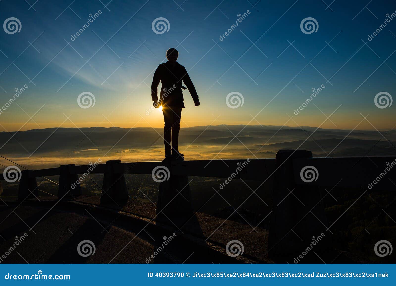 Man backlit at sunset stock photo. Image of standing - 40393790