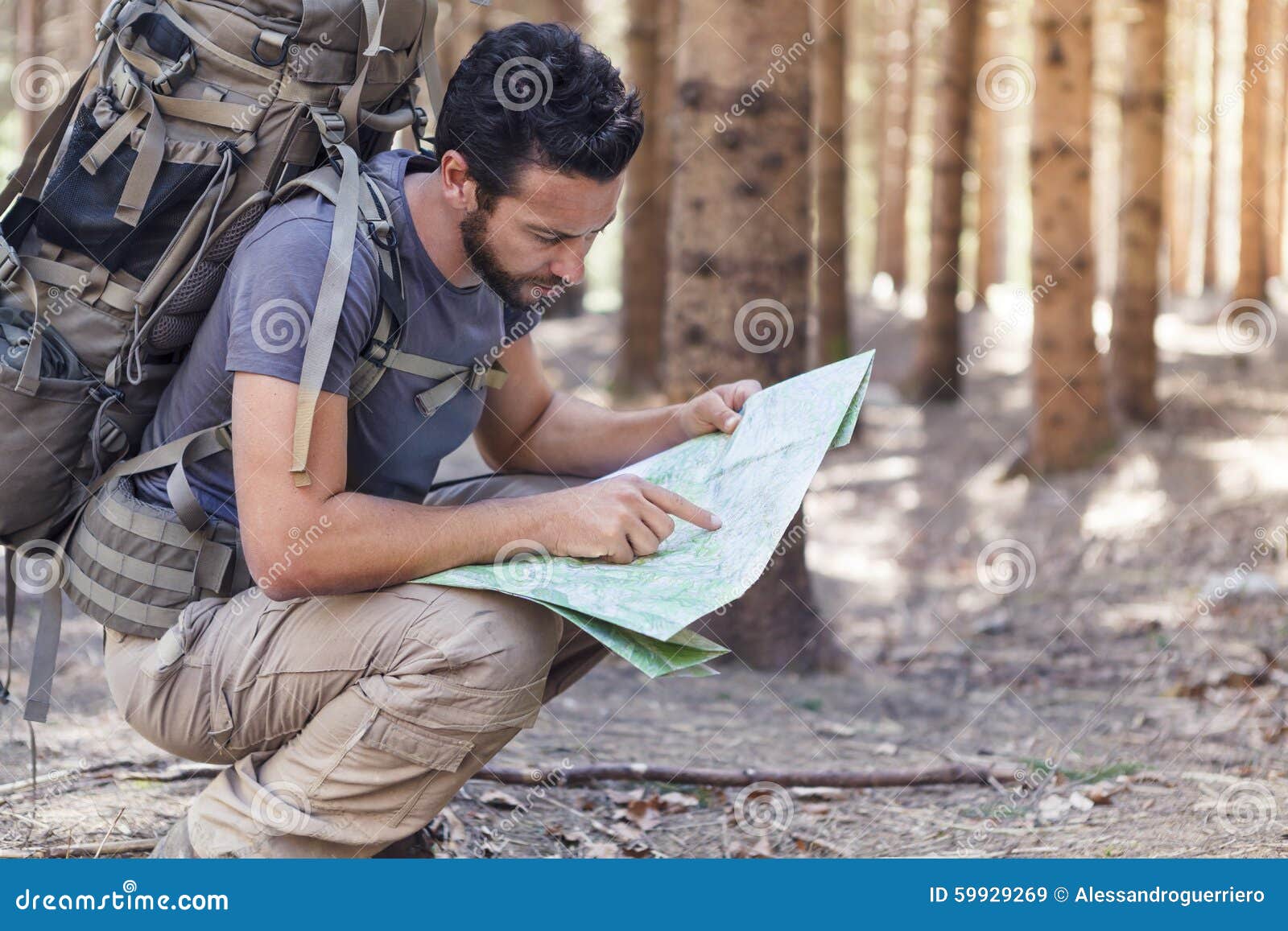 Man with Backpack and Map Searching Directions Stock Image - Image of ...
