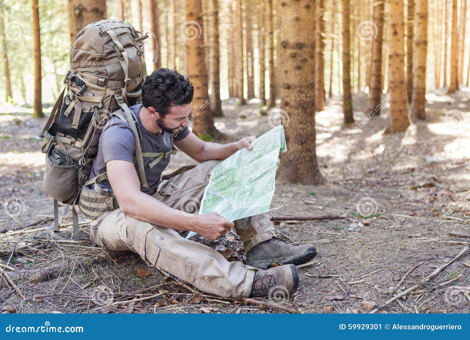 Man with Backpack and Map Searching Directions Stock Image - Image of ...