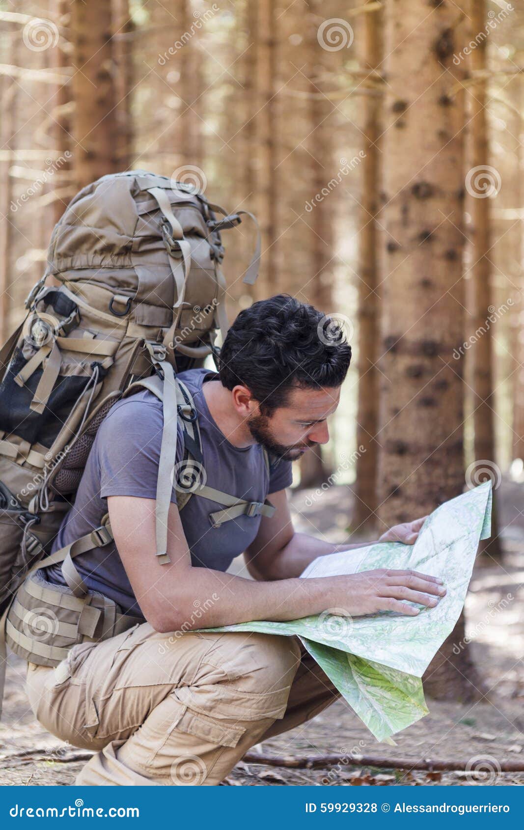 Man with Backpack and Map Searching Directions Stock Photo - Image of ...