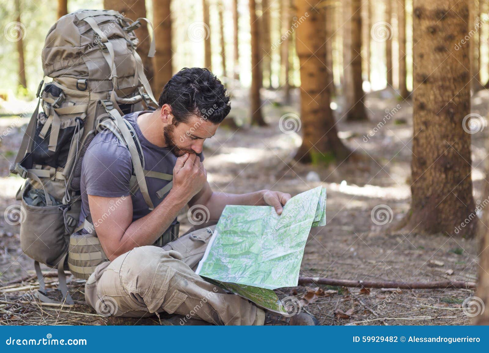 Man with Backpack and Map Searching Directions Stock Photo - Image of ...