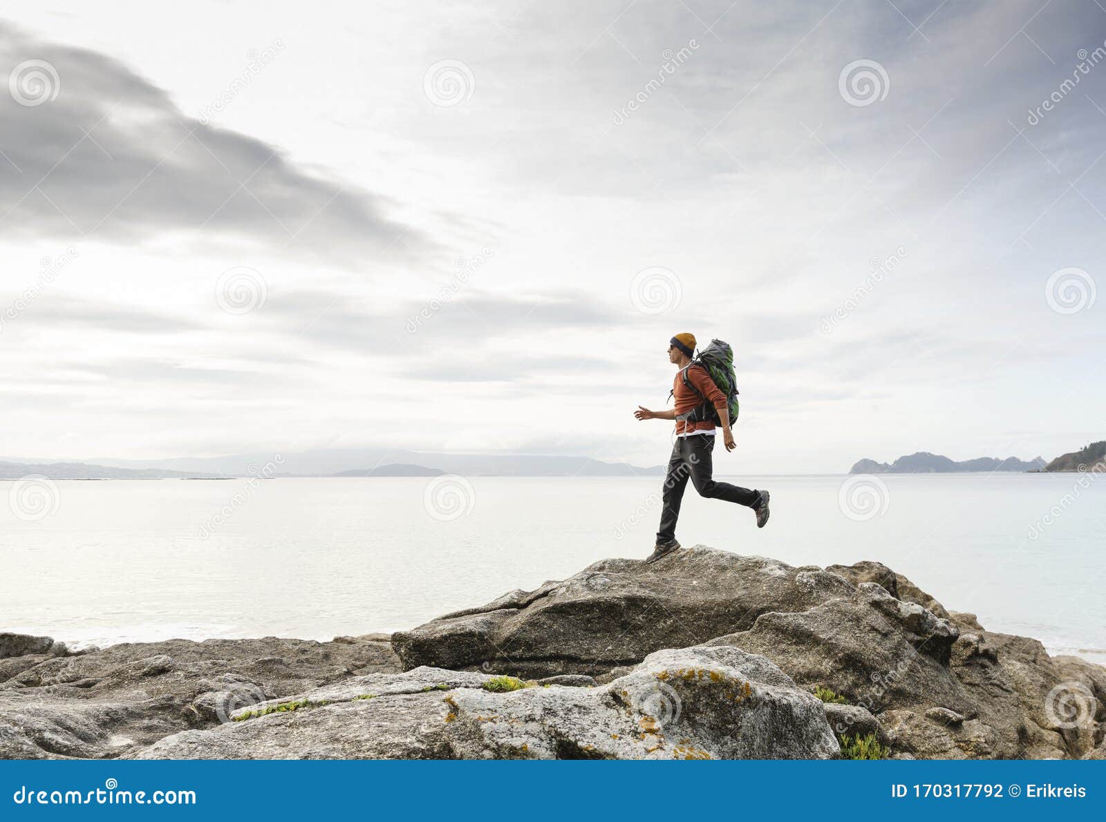 Man exploring the coast stock photo. Image of climber - 170317792