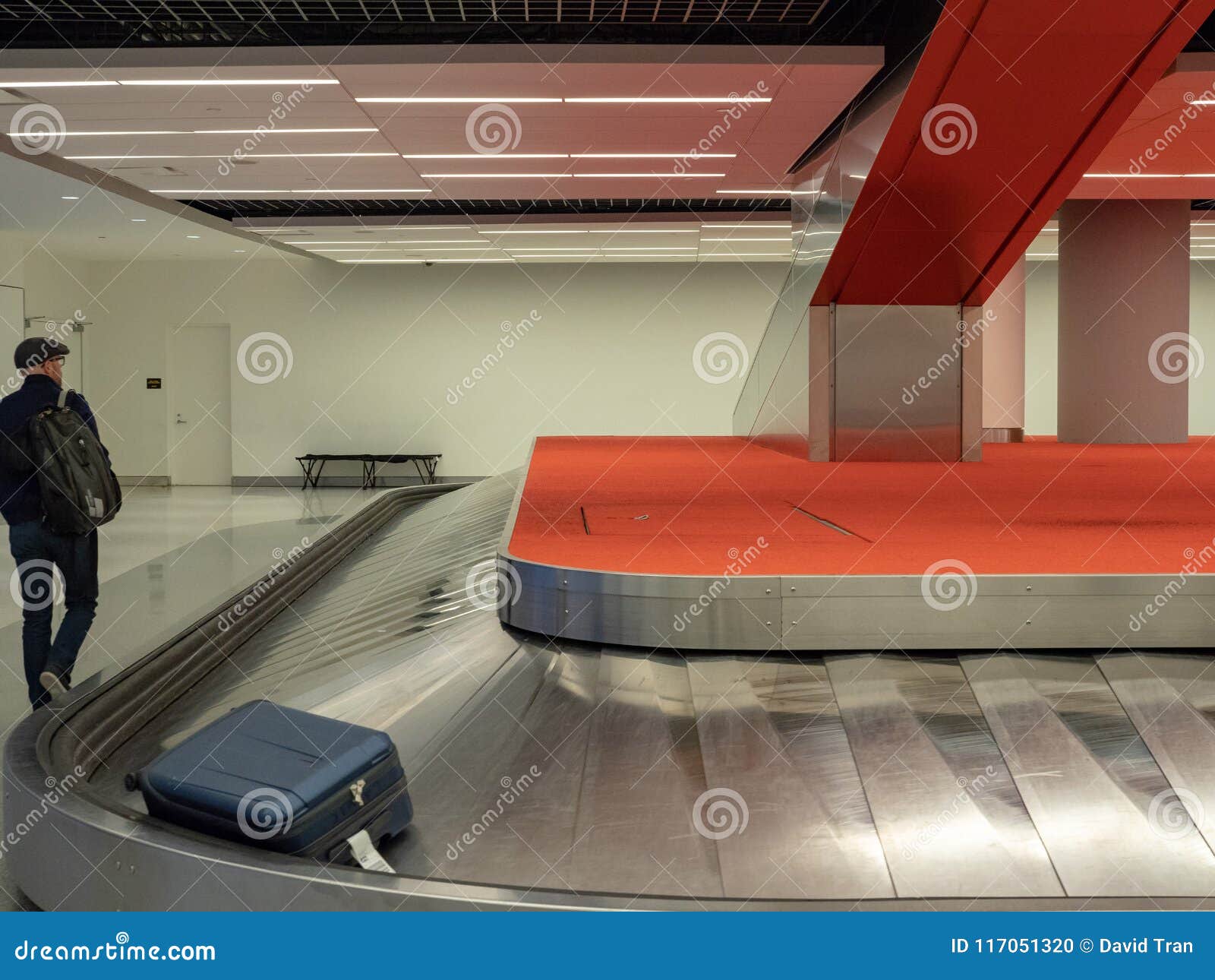 Man Walking Around Baggage Claim Carousel in Airport Editorial Image ...